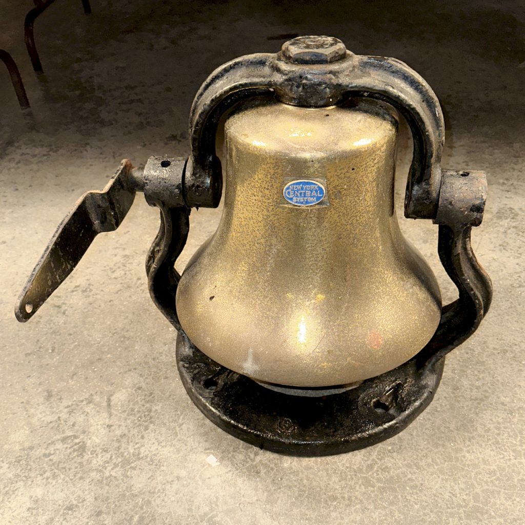 LOT 145 LARGE BRASS TRAIN BELL WITH AN OVAL BLUE PLAQUE “NEW YORK ...