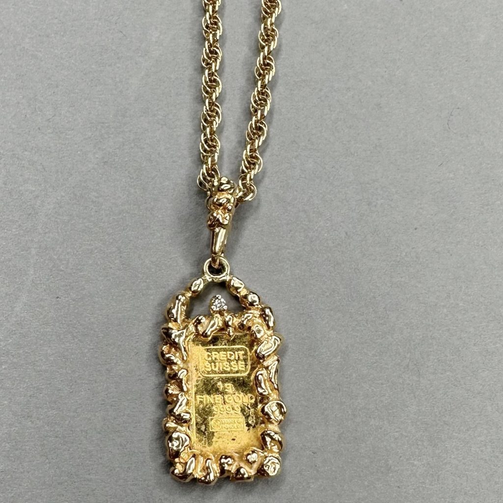 LOT 002 14K YG CHAIN WITH 24K YG FRAMED 1 GRAM INGOT (14K YG FRAME ...